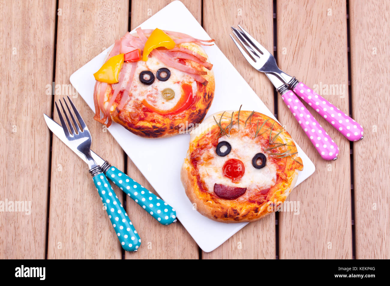 face shape pizza Stock Photo - Alamy