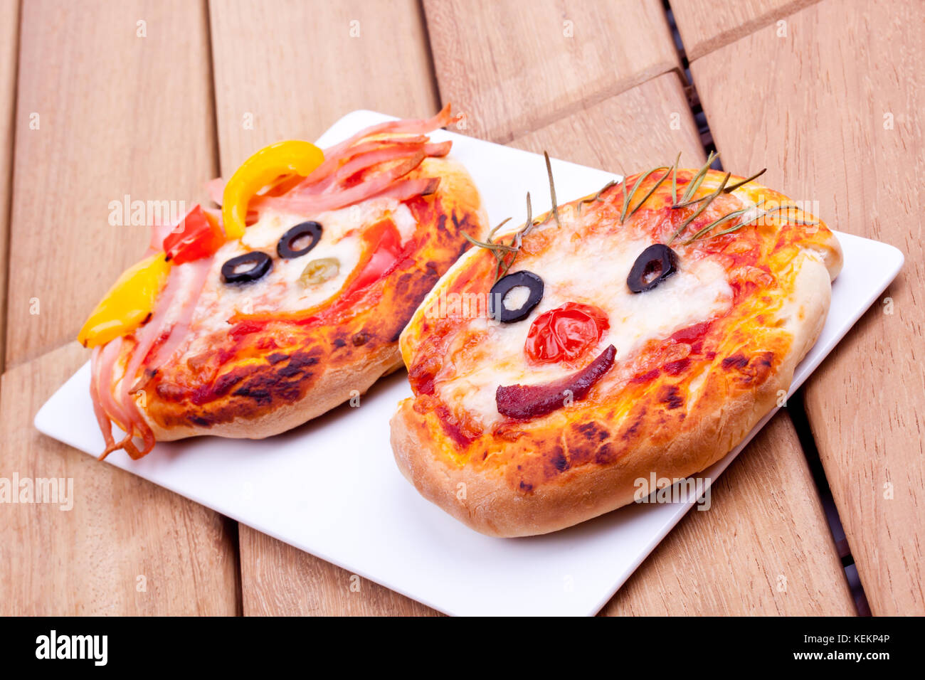 face shape pizza Stock Photo - Alamy