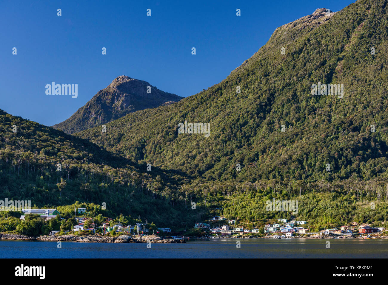 Village of Puerto Gaviota over Canal Puyuhuapi, Valdivian temperate ...