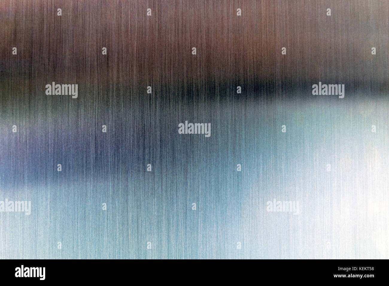 Convex polished shiny steel metal surface with colored reflections and ...