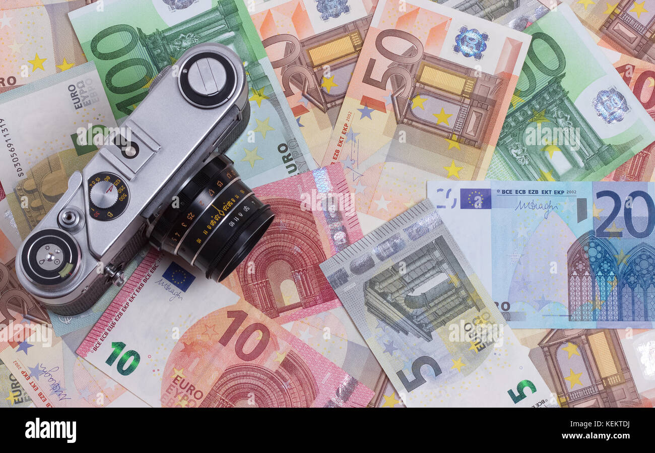 Vintage camera on euro money abstract background Stock Photo - Alamy
