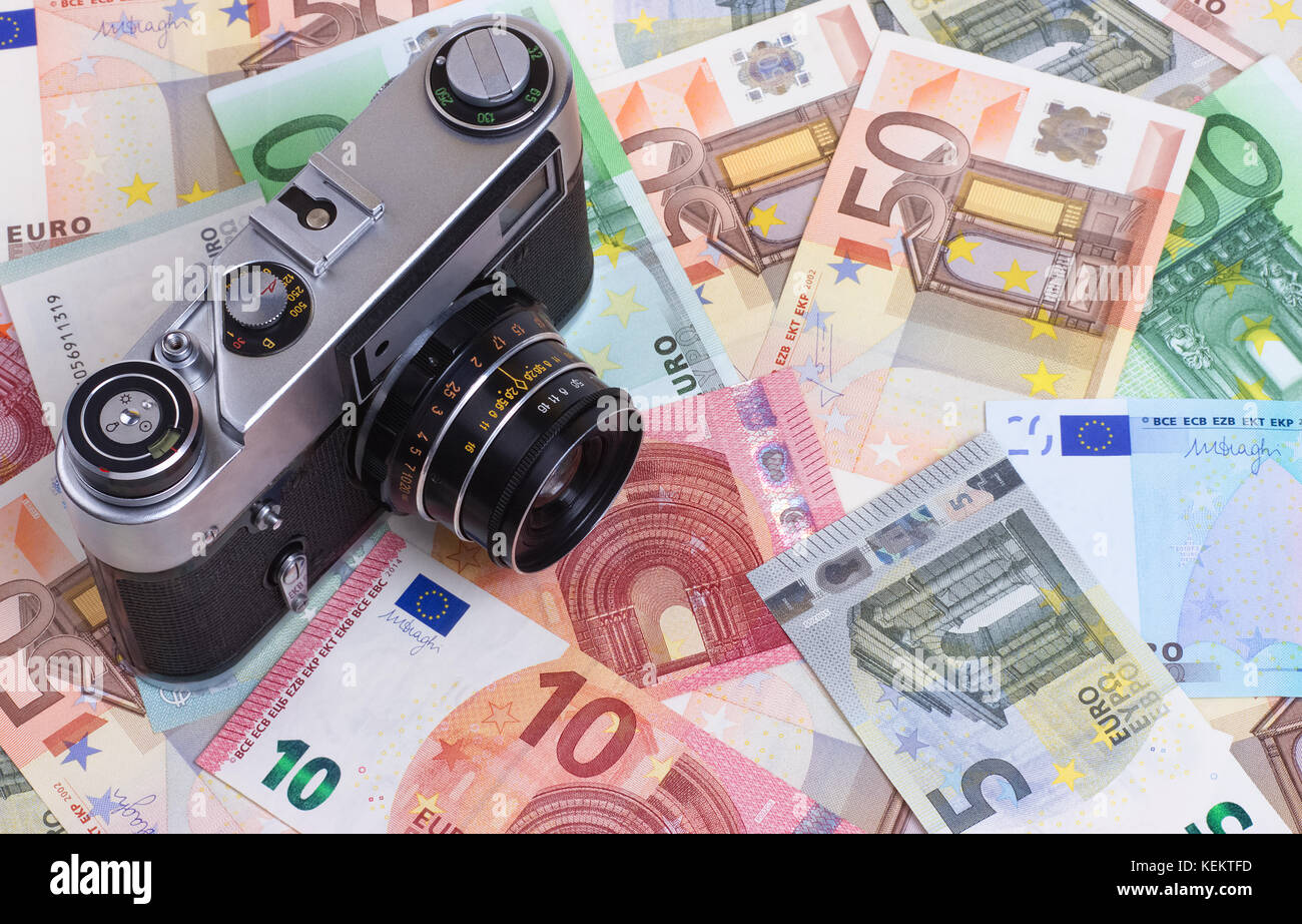 Vintage camera on euro money abstract background Stock Photo - Alamy