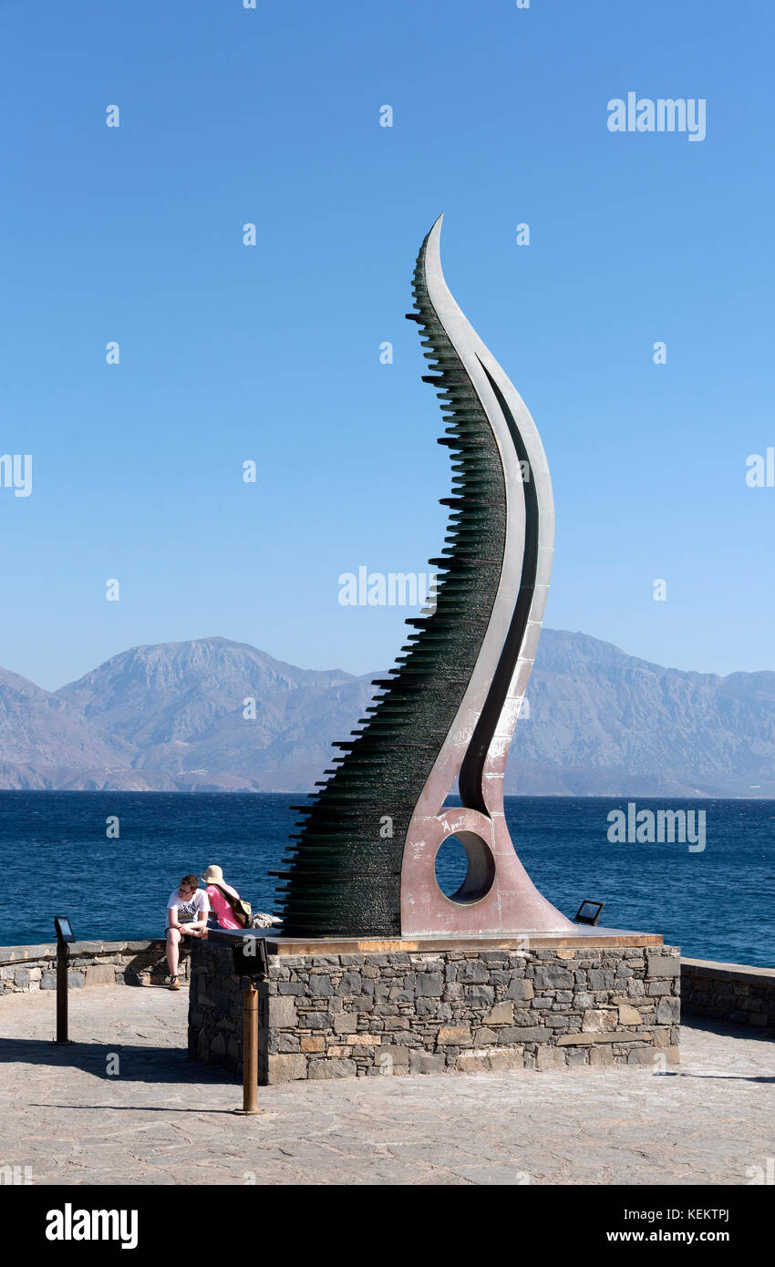 Port of Agios Nikolaos, Crete, Greece. The Amalthea's Horn sculpture on ...