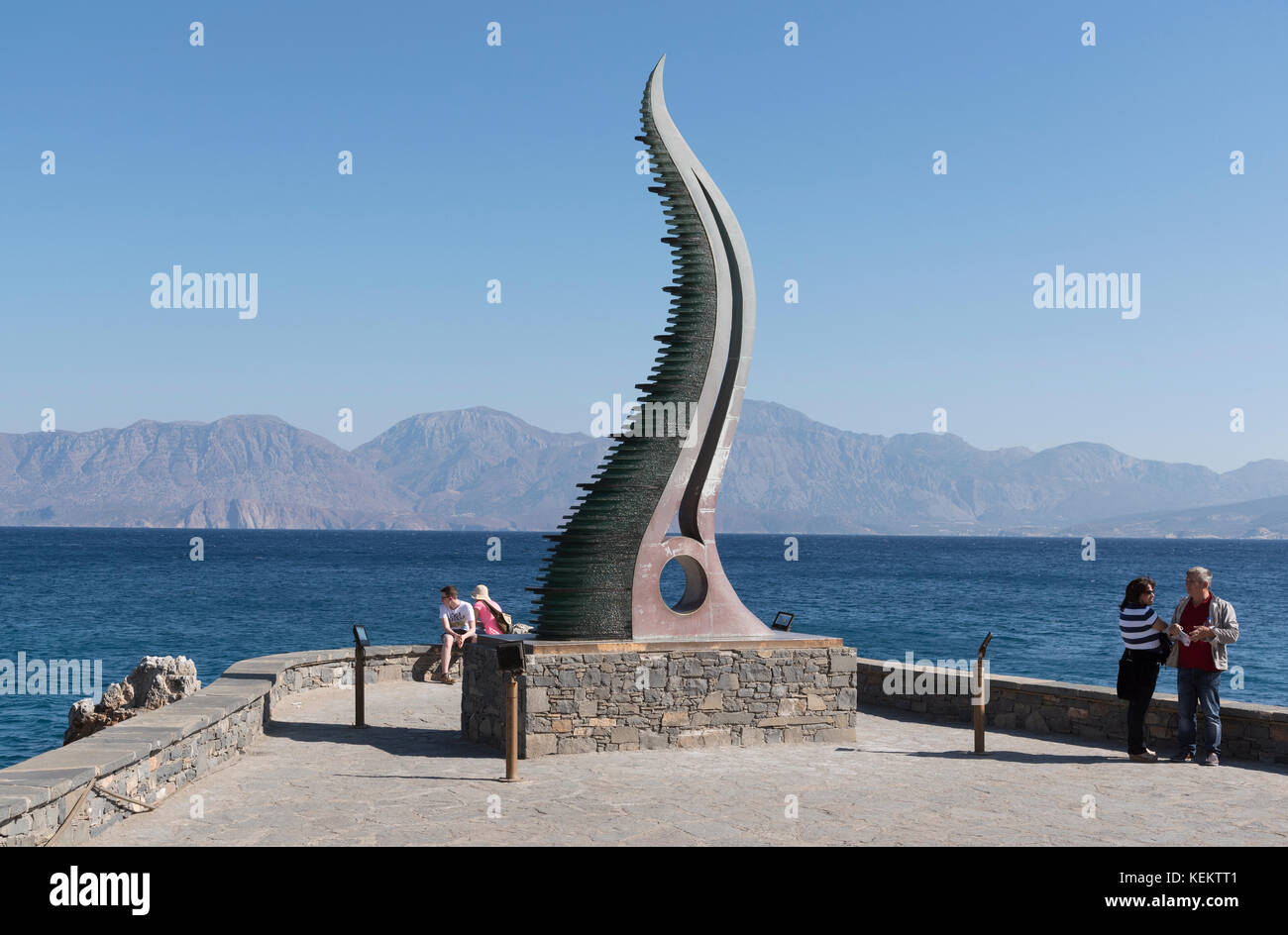 Port of Agios Nikolaos, Crete, Greece. The Amalthea's Horn sculpture on ...