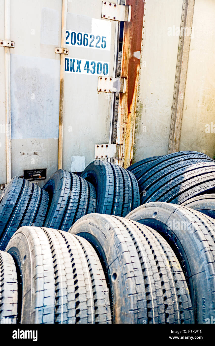 Pile of old Tyres in a shop Stock Photo - Alamy