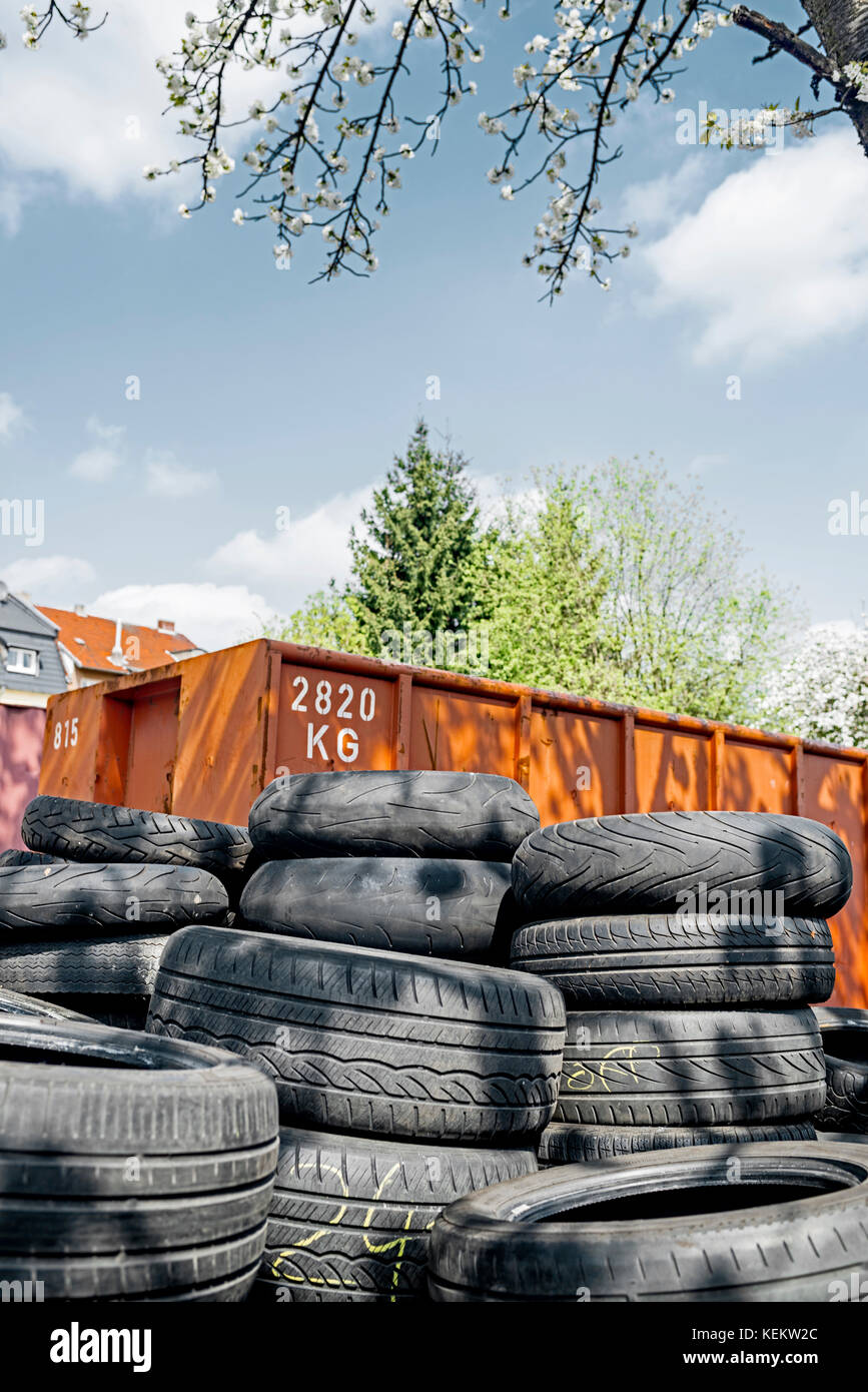 Pile of old Tyres in a shop Stock Photo - Alamy