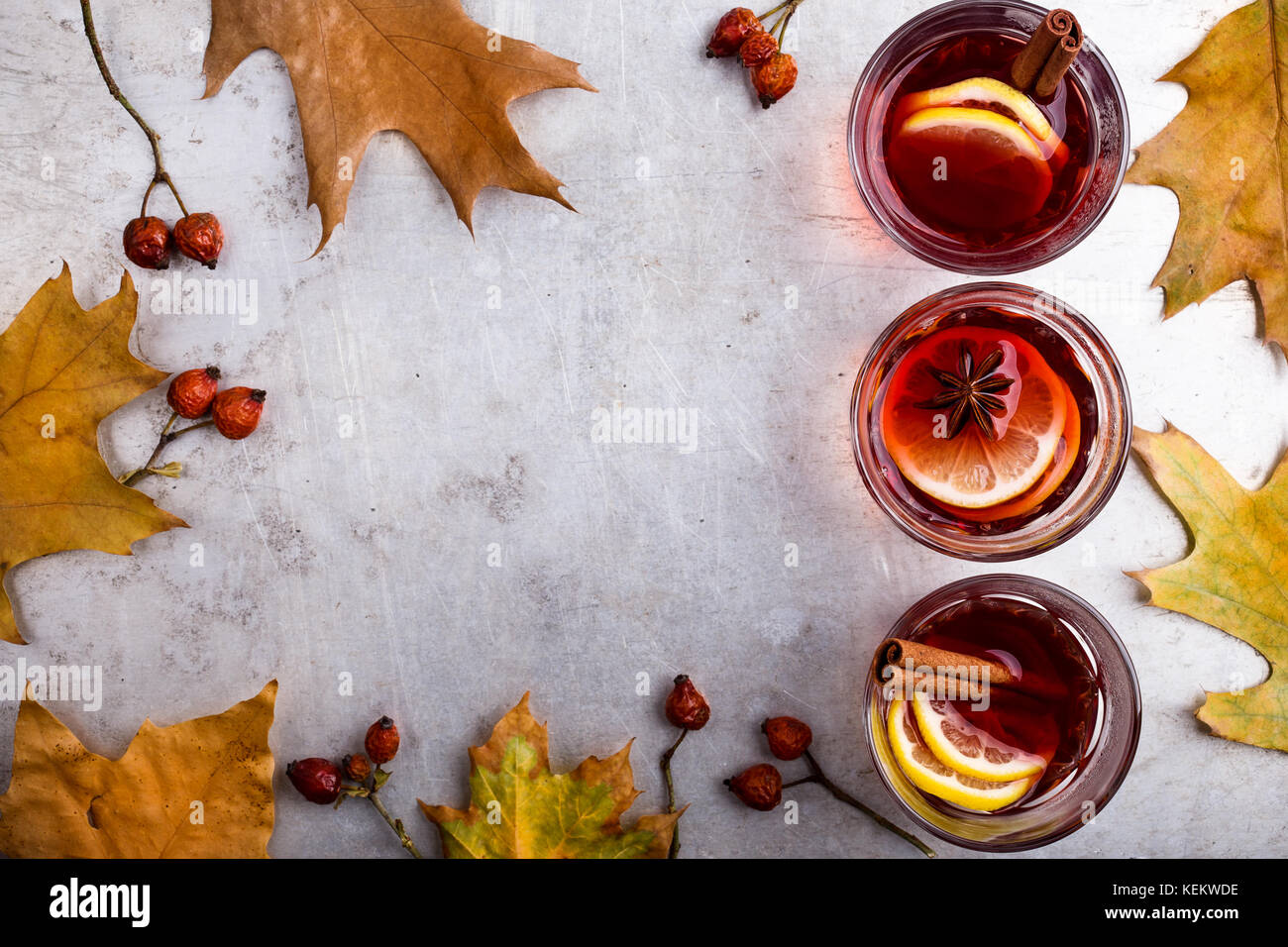 Hot red tea with lemon on light gray table with copy space viewed from ...