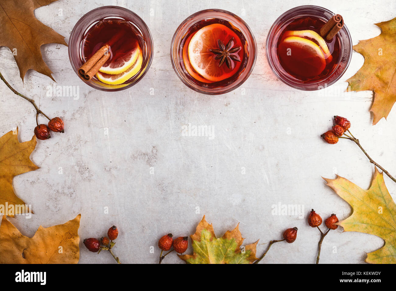 Hot red tea with lemon on light gray table with copy space viewed from ...