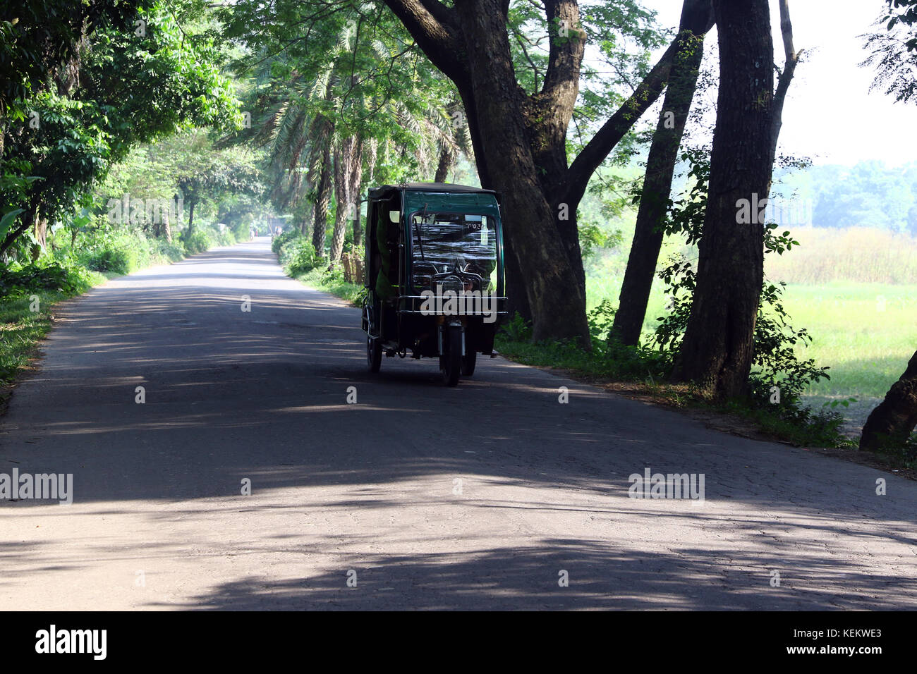 Bangladesh - Battery rickshaw ride Stock Photo - Alamy