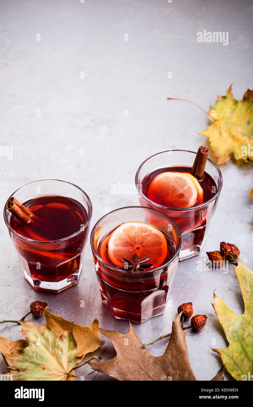 Hot red tea with lemon on light gray table with copy space, delicious ...