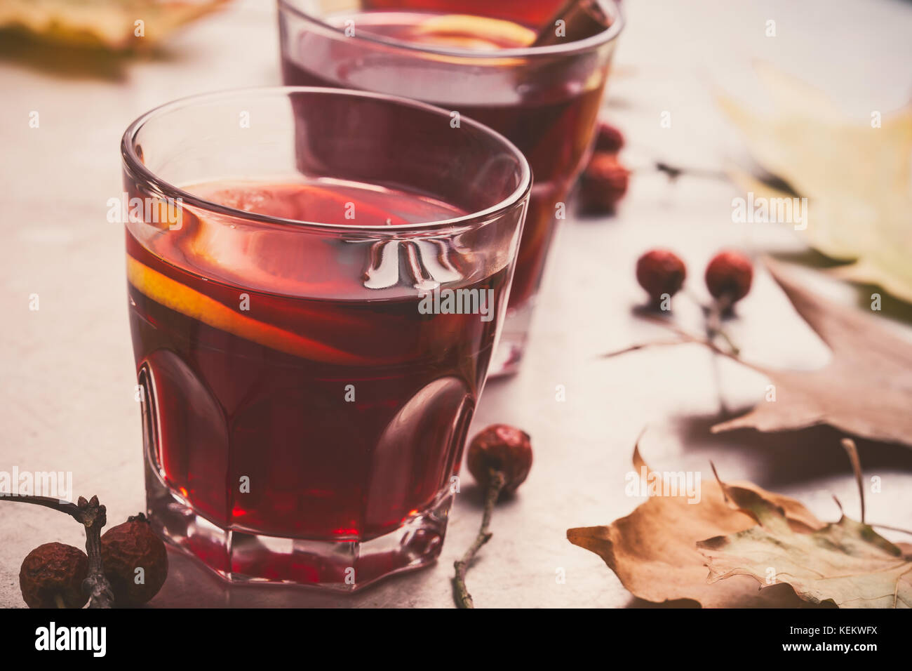 Hot red tea with lemon on light gray table with copy space, delicious ...