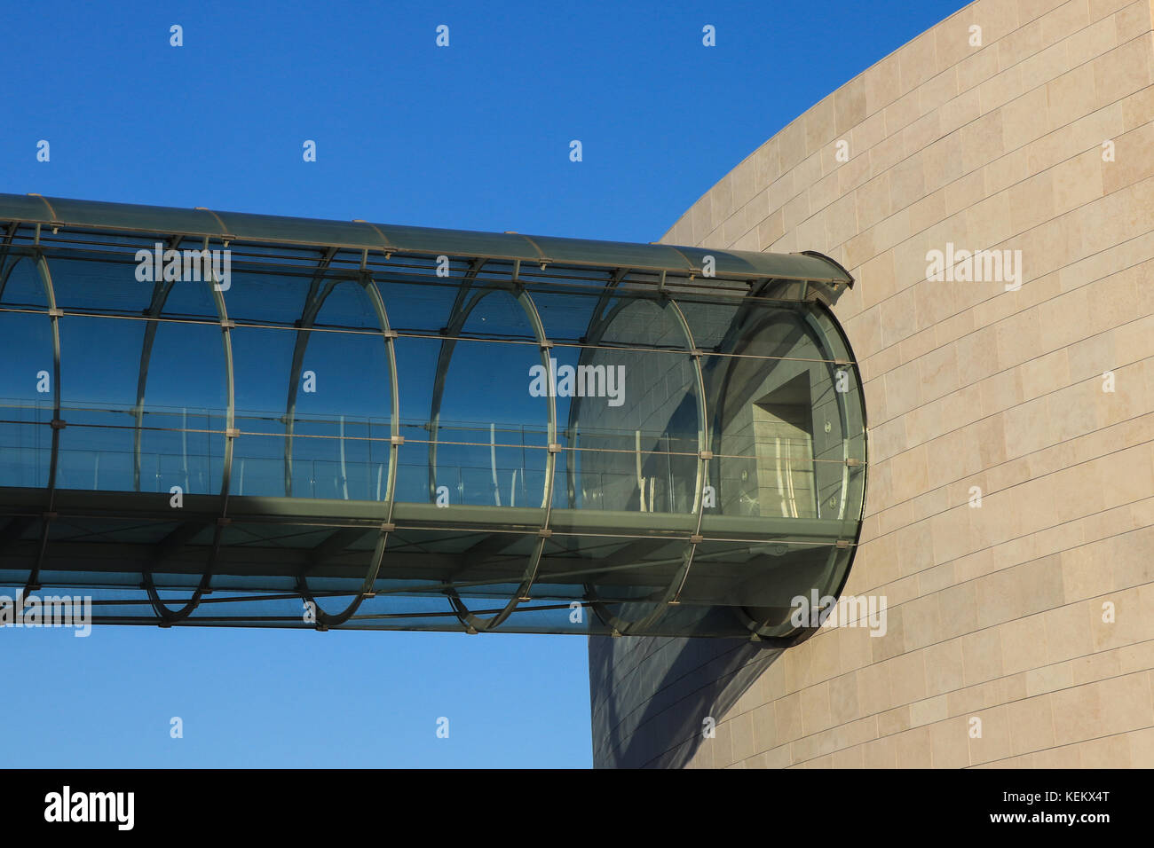 Glass tunnel bridge in a modern building Stock Photo - Alamy
