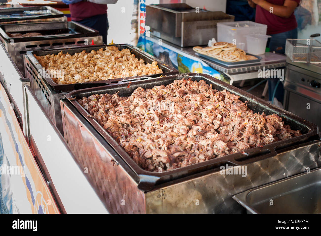 Street food. Roasted meat in the pots of a kitchen in the street Stock ...