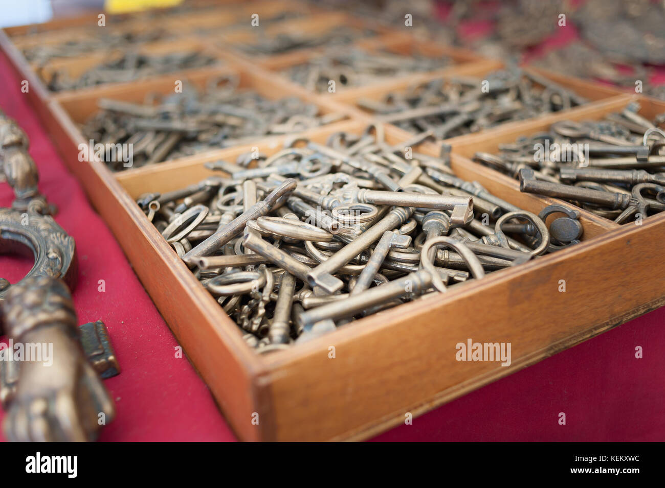 Closeup of display of old and brass reproduction keys in bulk for ...