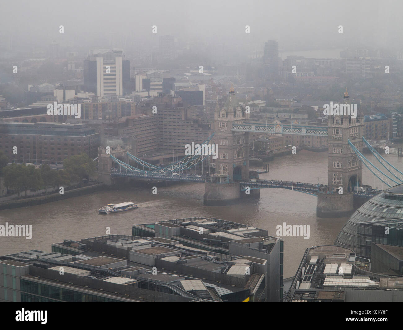 Tower Bridge in London on a grey, dull foggy day Stock Photo - Alamy