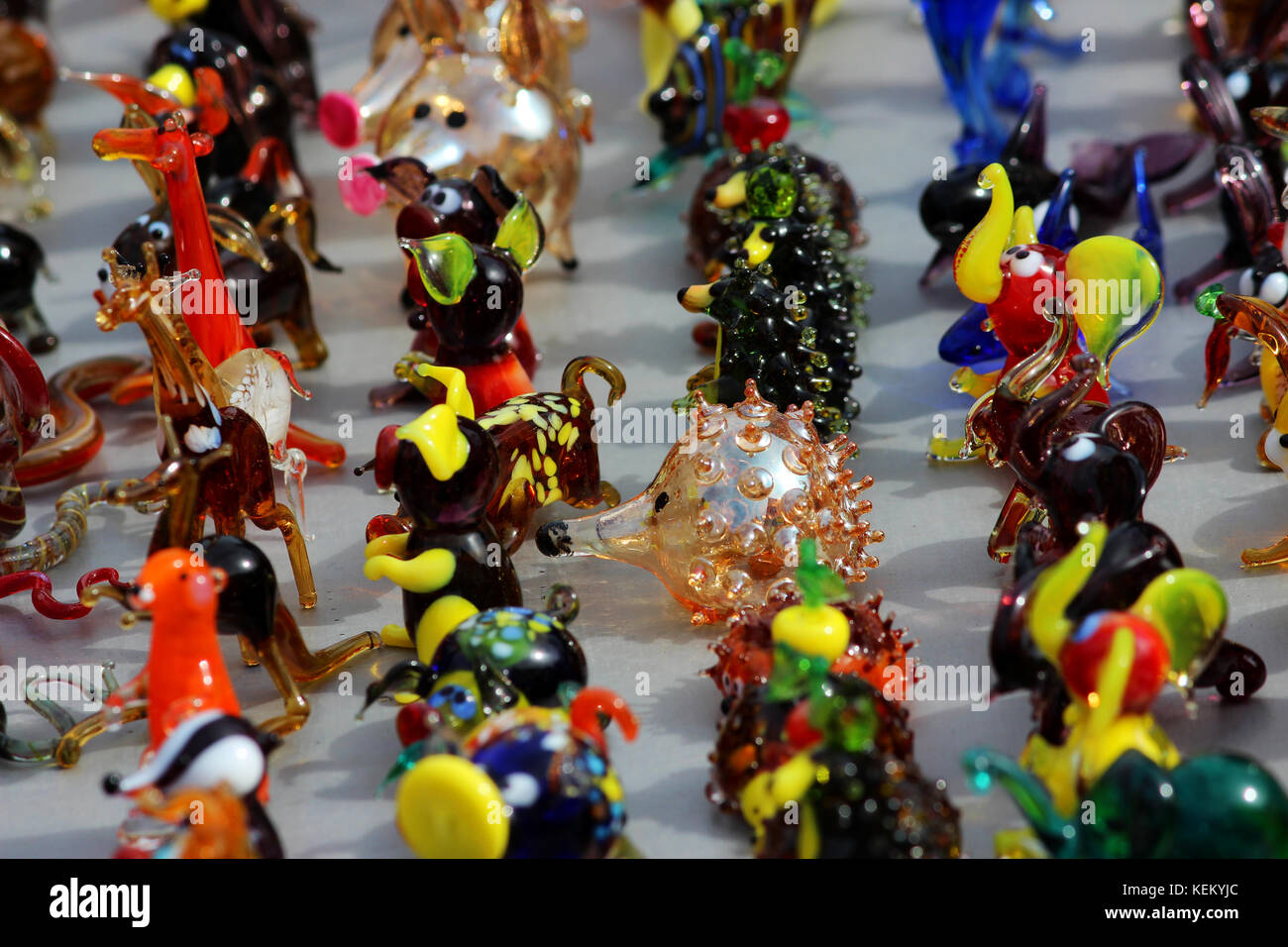Miniature glass toy souvenirs of colored glass in the form of animals ...