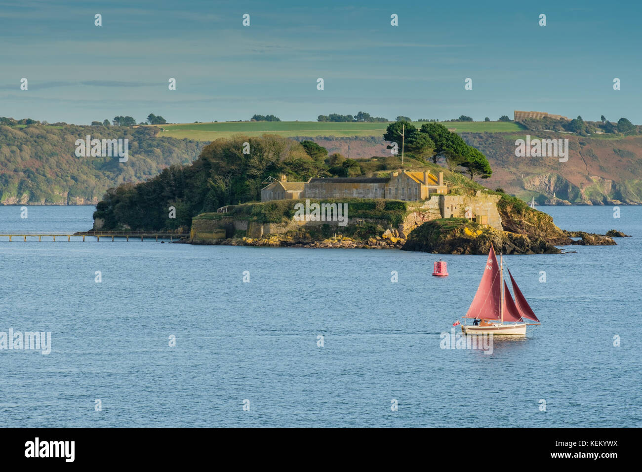 Sailing boat passing Drake's Island, Plymouth Sound, Plymouth, Devon ...