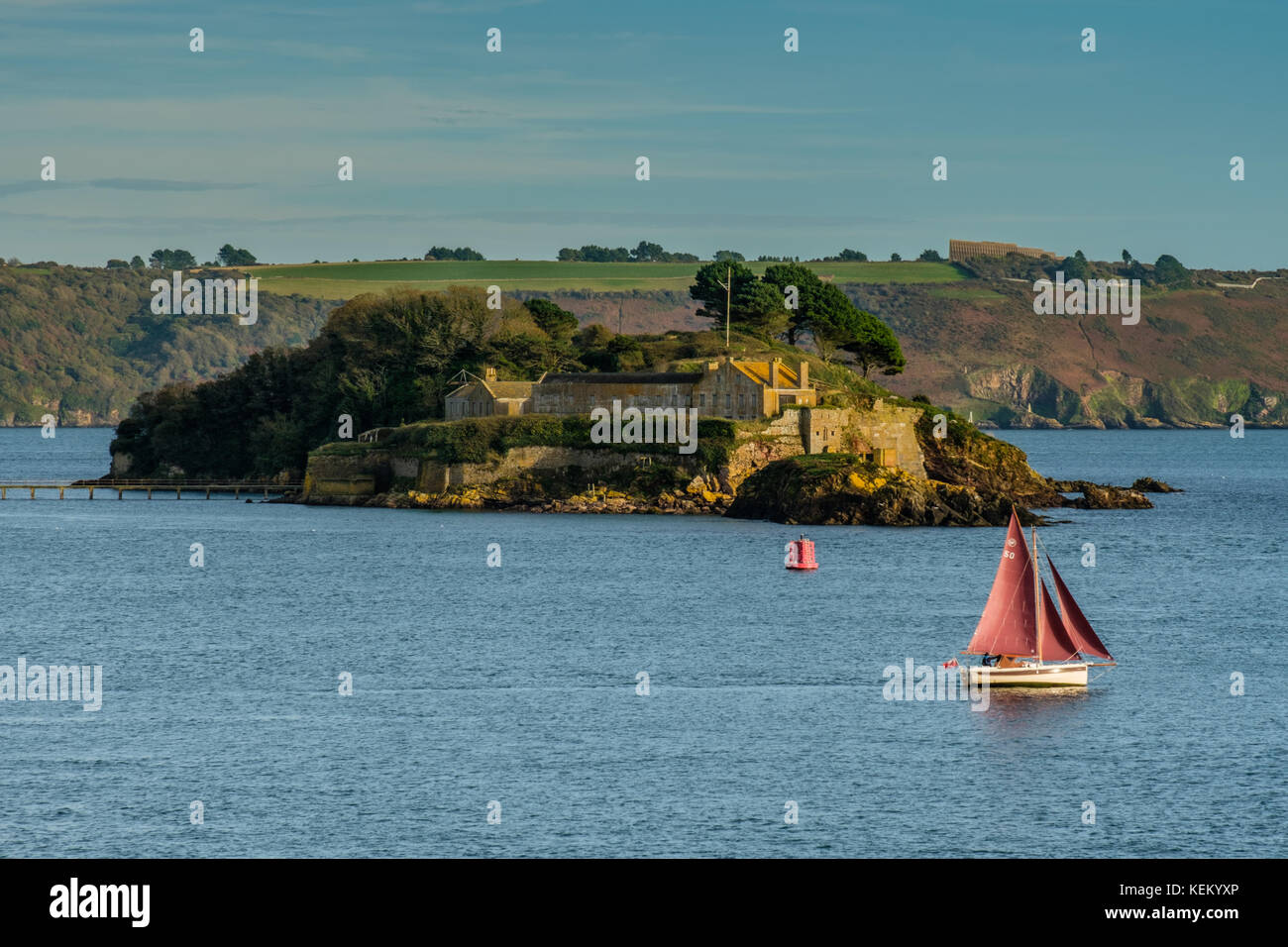 Sailing boat passing Drake's Island, Plymouth Sound, Plymouth, Devon ...