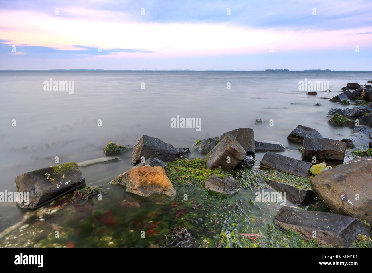 Rocks on the zeeland coast of the netherlands hi-res stock photography ...