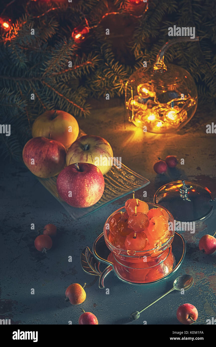 Christmas card with beautiful fir-tree branches, apples and small jam ...