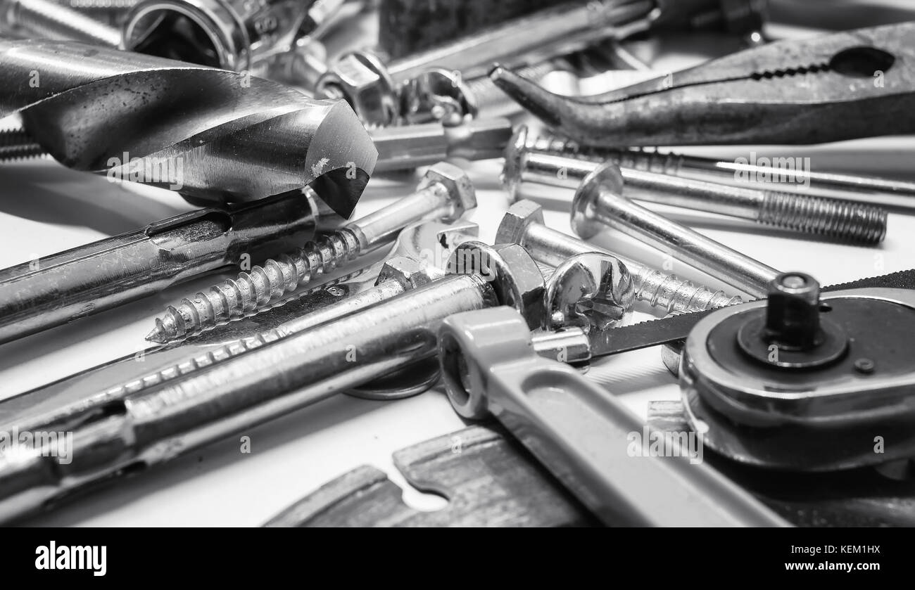 Working metal tools of silver color on the background Stock Photo - Alamy