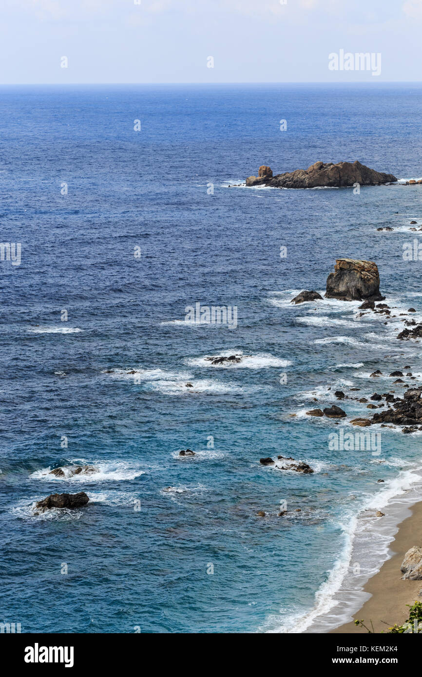 Seascape with rocks in the water Stock Photo - Alamy