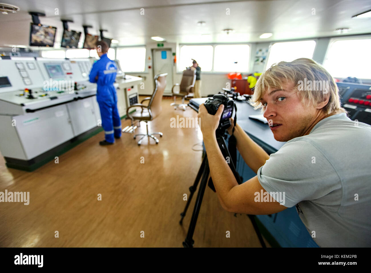 Photographer reporter photographing the operator control panel ...