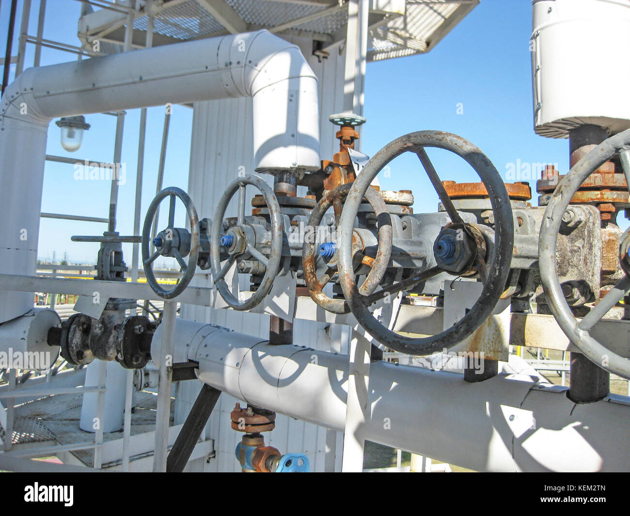 pipelines and latches. Oil refinery. Equipment for primary oil refining Stock Photo - Alamy