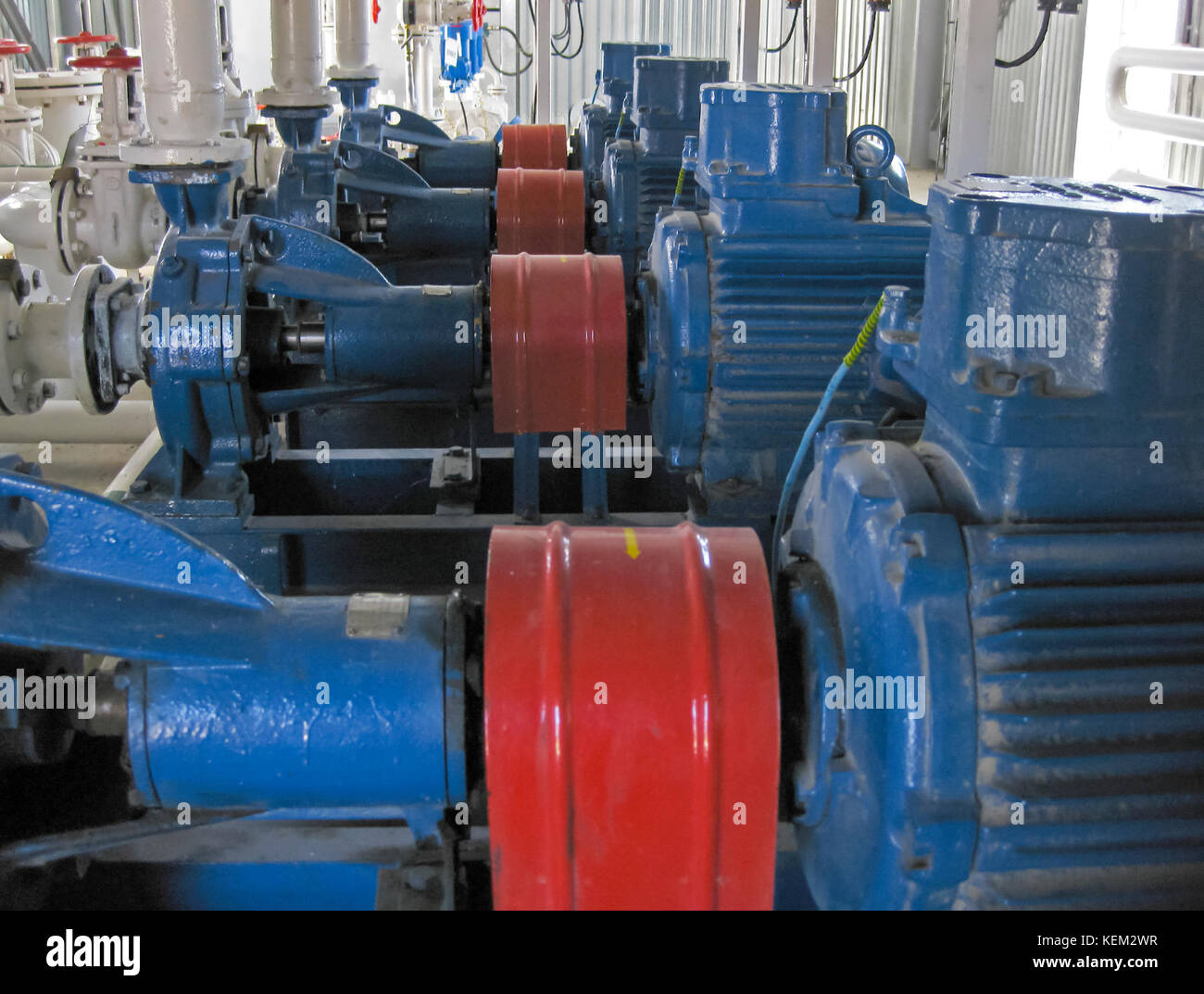 Pumps for water. Equipment for primary oil refining Stock Photo - Alamy