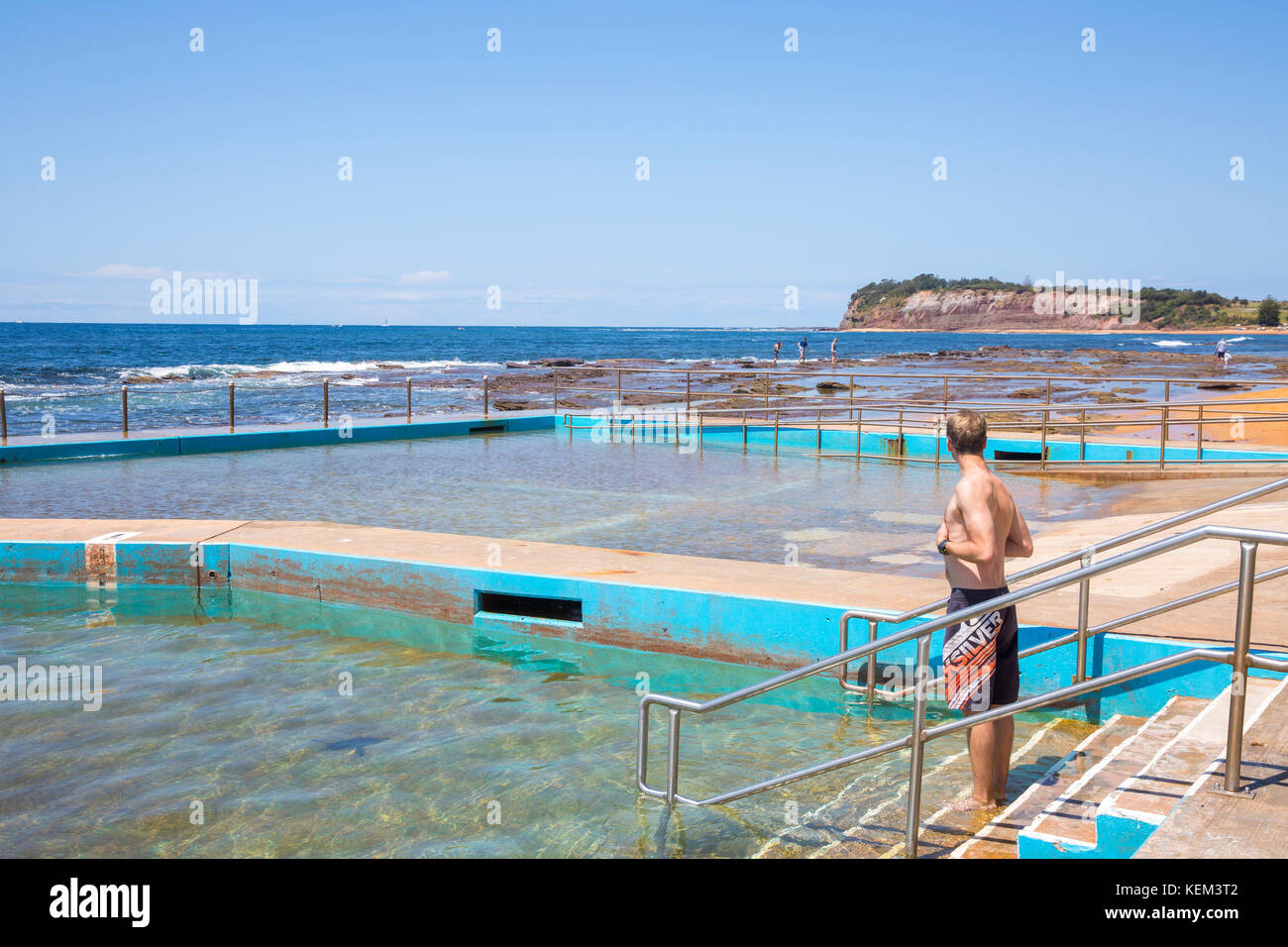 Man heading for a swim in the ocean beach pool at Collaroy beach,Sydney ...