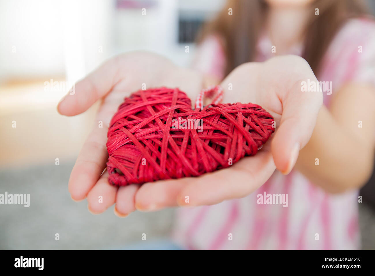 Red heart shape in female hand. Love,romance, health Stock Photo - Alamy