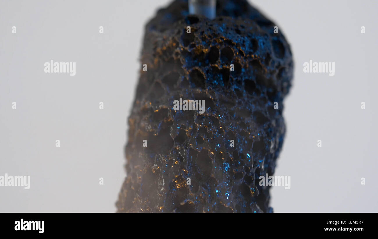 Black mixture out of the flask. glass flasks on black background Stock ...