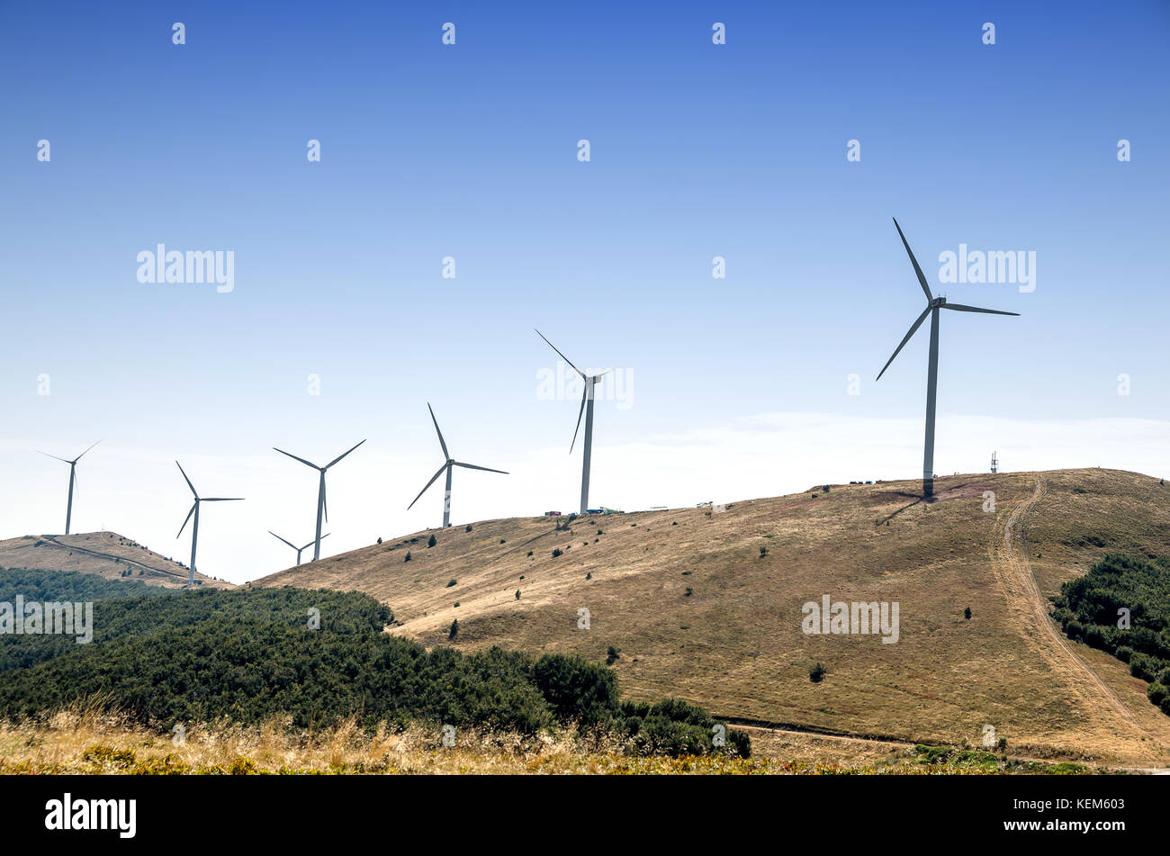 Windmill farm in mountain Stock Photo - Alamy