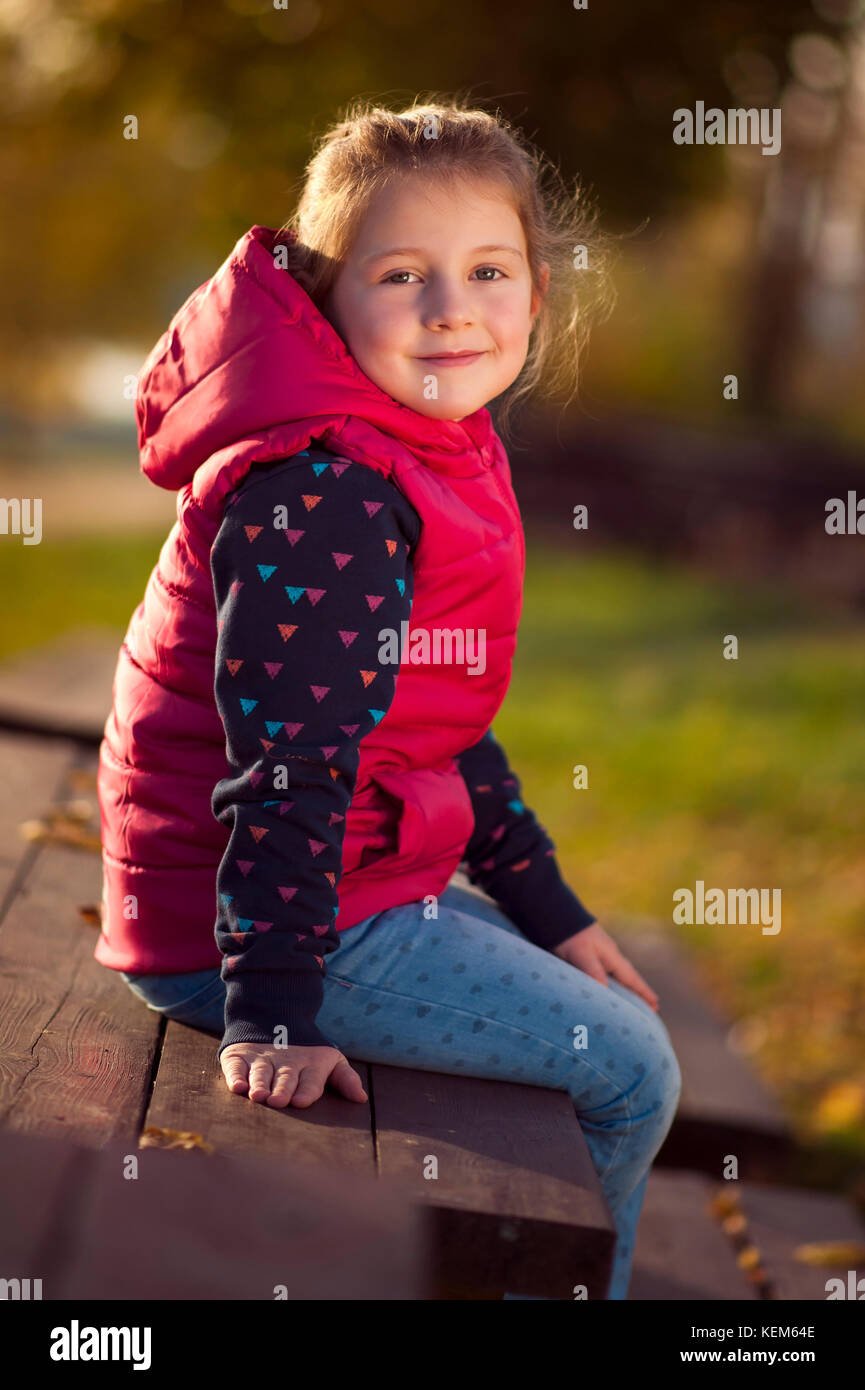 Girl sitting kids hi-res stock photography and images - Alamy