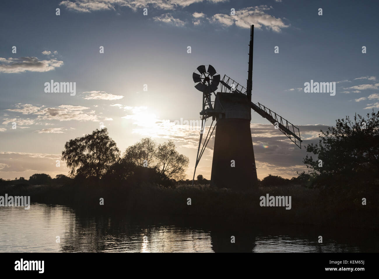 How Hill Windmill at Sunset on the Norfolk Broads Stock Photo - Alamy