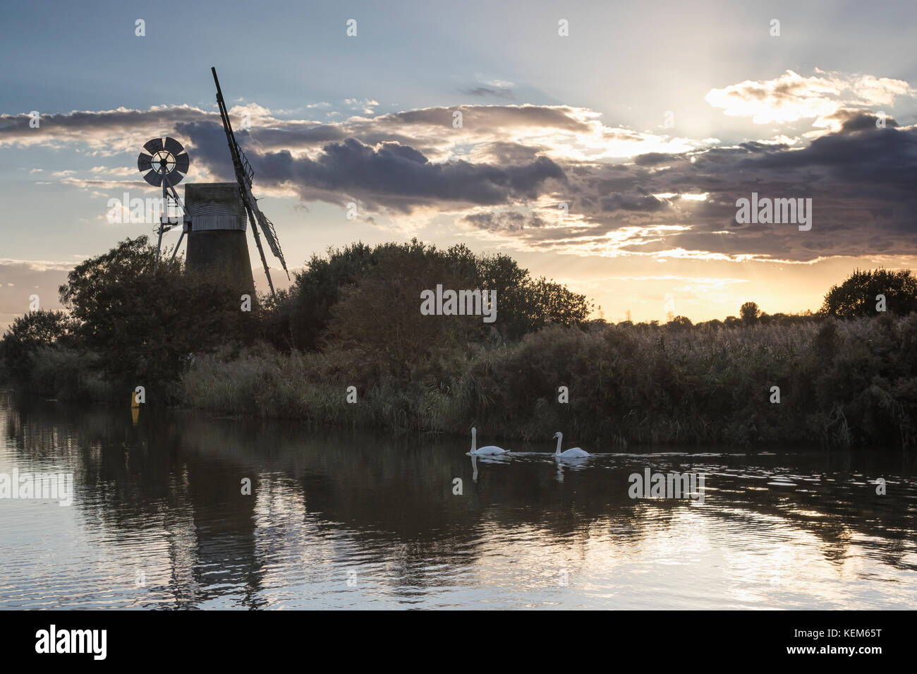 How Hill Windmill at Sunset on the Norfolk Broads Stock Photo - Alamy