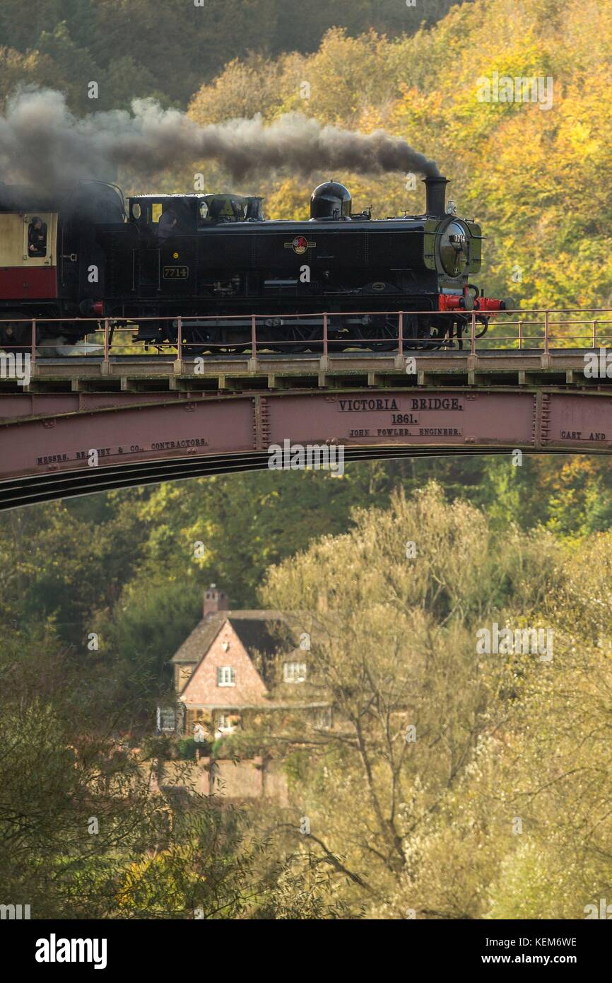 A steam engine train crosses over the Victoria Bridge on the Severn ...