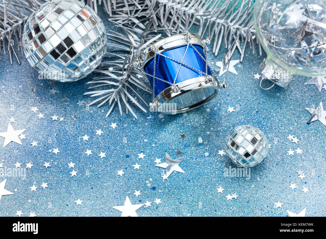 decorative christmas tree balls with spangles and silver drum on blue ...