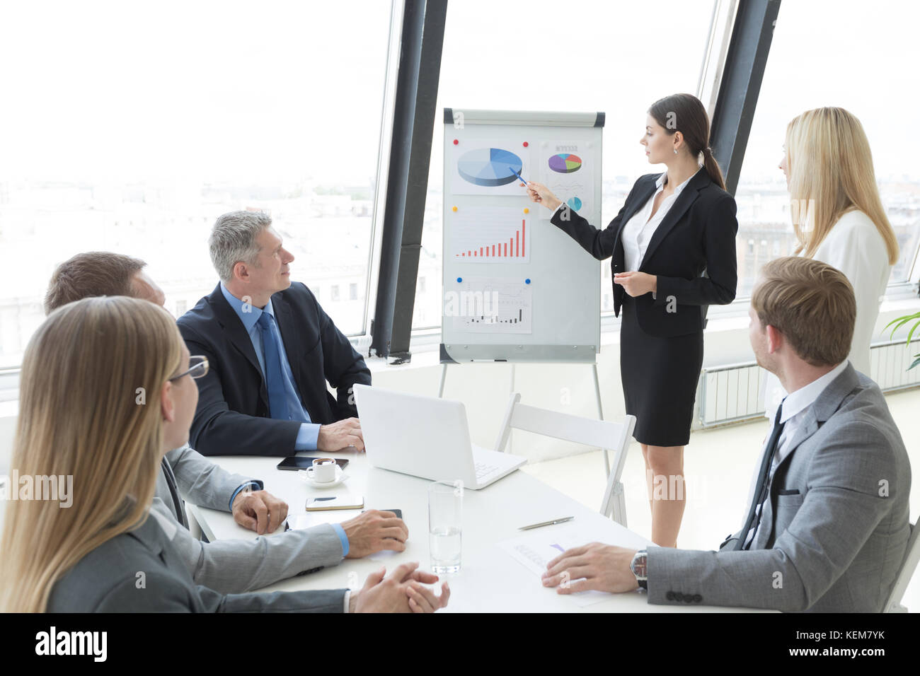 Business people team at presentation working with charts and diargams ...