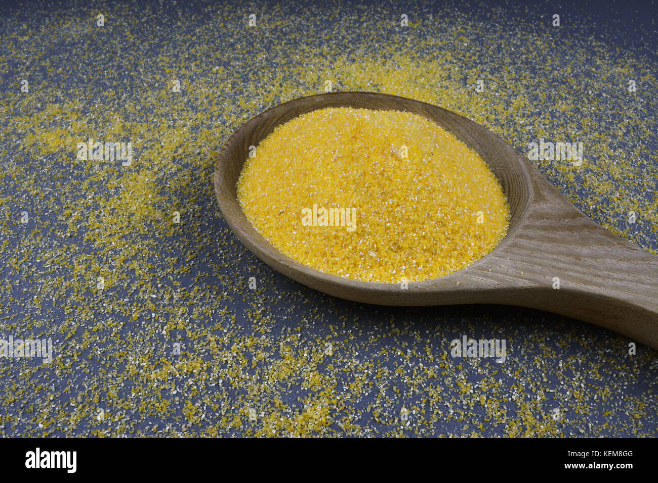 Corn meal of dry polenta on dark background. Flat lay style Stock Photo ...