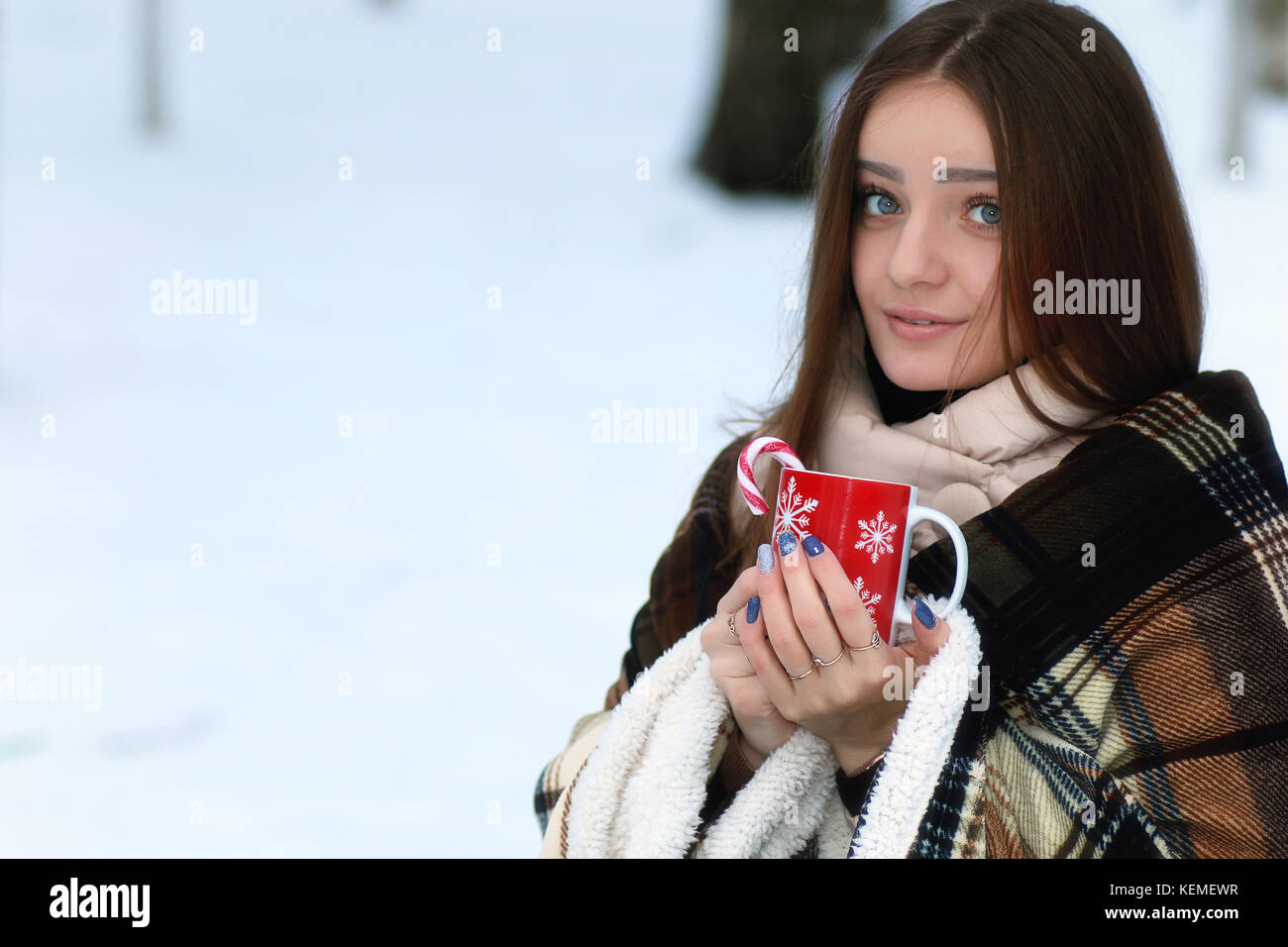 Young beautiful girl in winter snowy day Stock Photo - Alamy