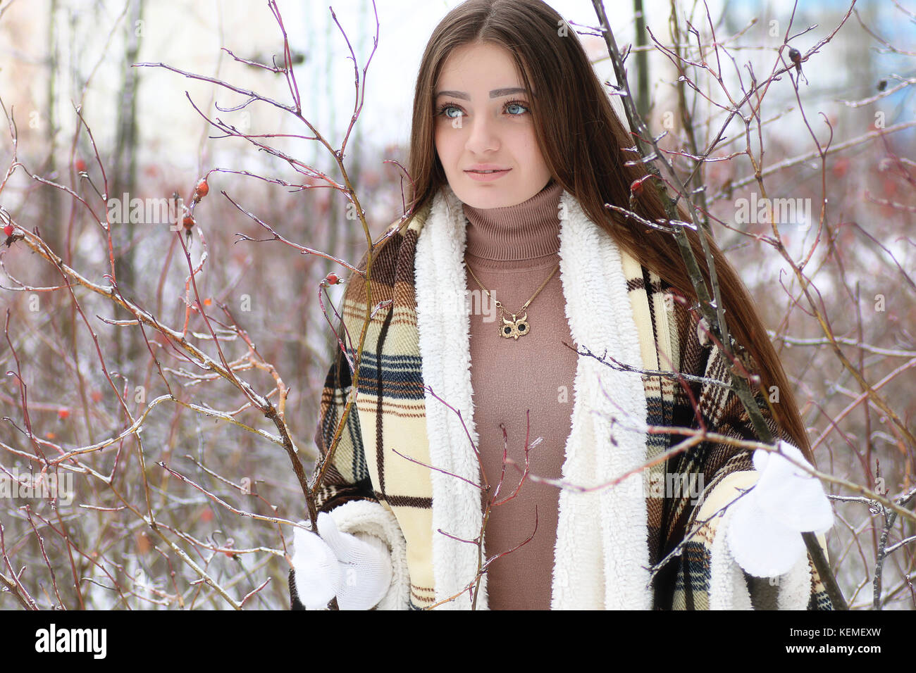 Young beautiful girl in winter snowy day Stock Photo - Alamy