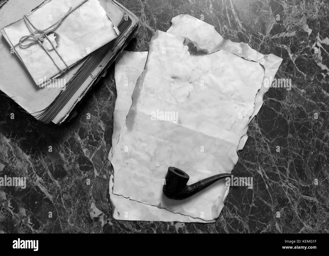 papers and book on detective work table with tools Stock Photo - Alamy