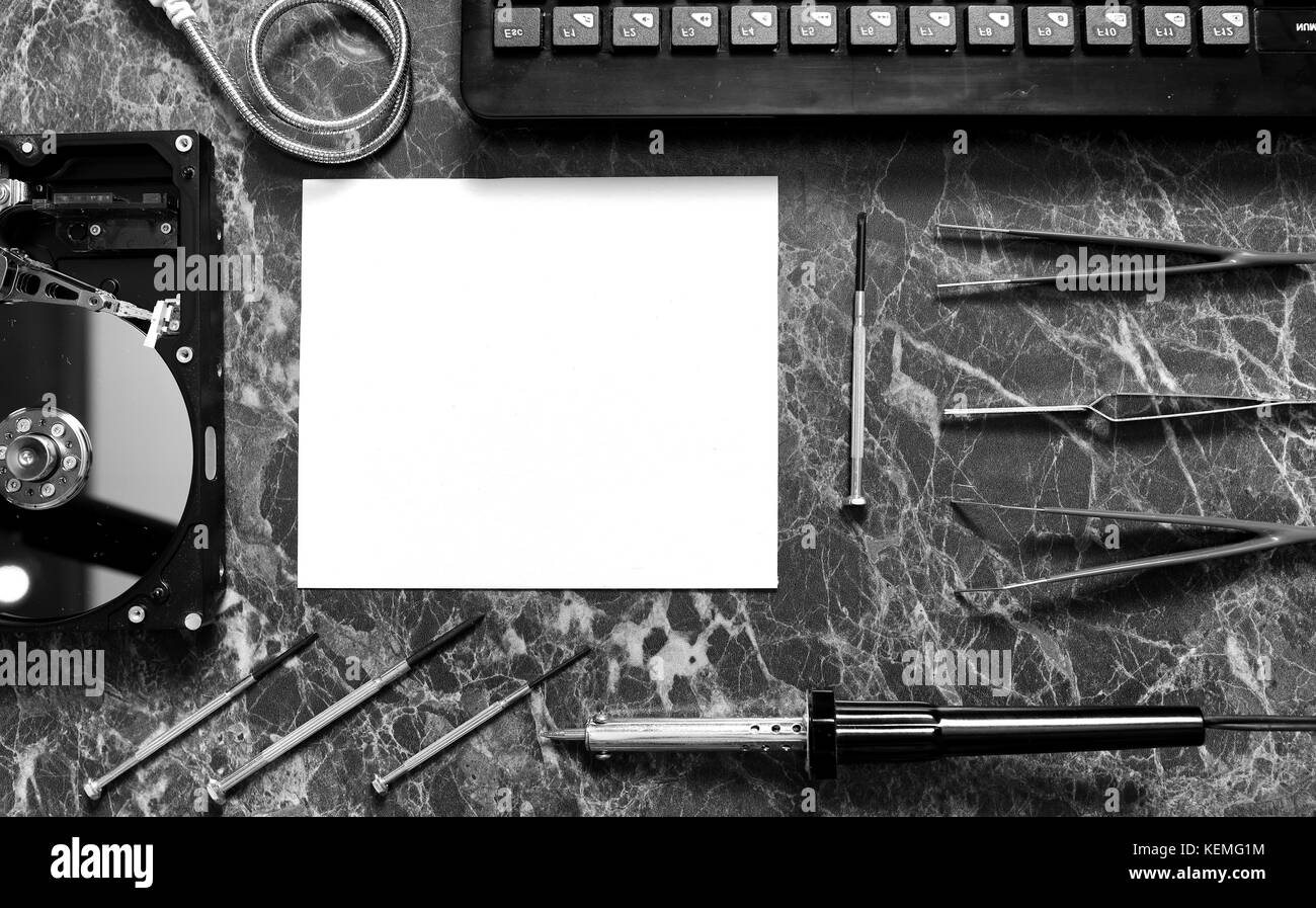 Black And White Photo Of Clean Sheet Of Paper On Work Desktop Stock black-and-white-photo-of-clean-sheet-of-paper-on-work-desktop-stock