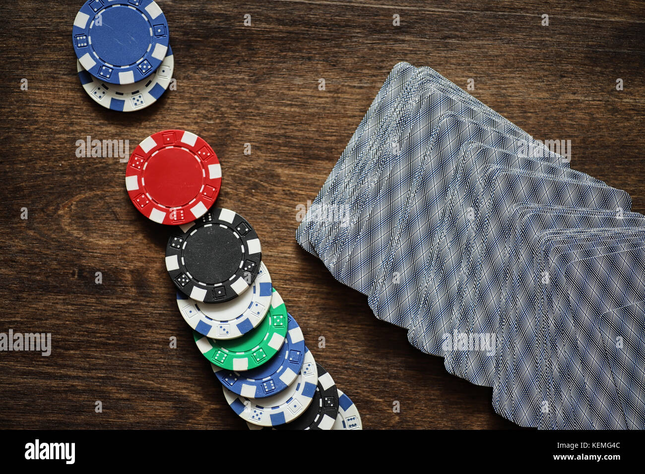 Playing chips and a deck of cards Stock Photo - Alamy
