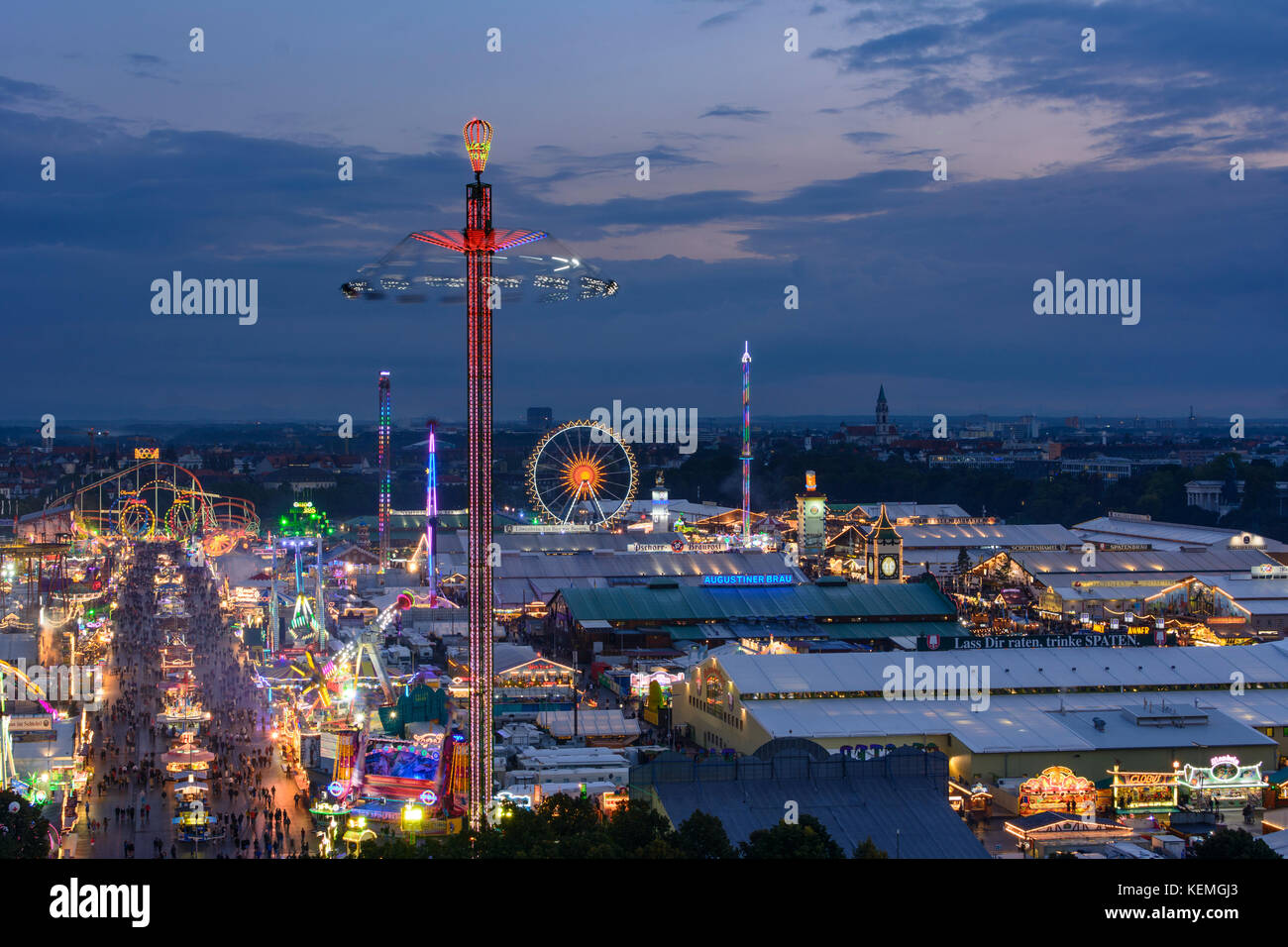 Oktoberfest beer festival: view, beer tent, rides, roller coaster ...