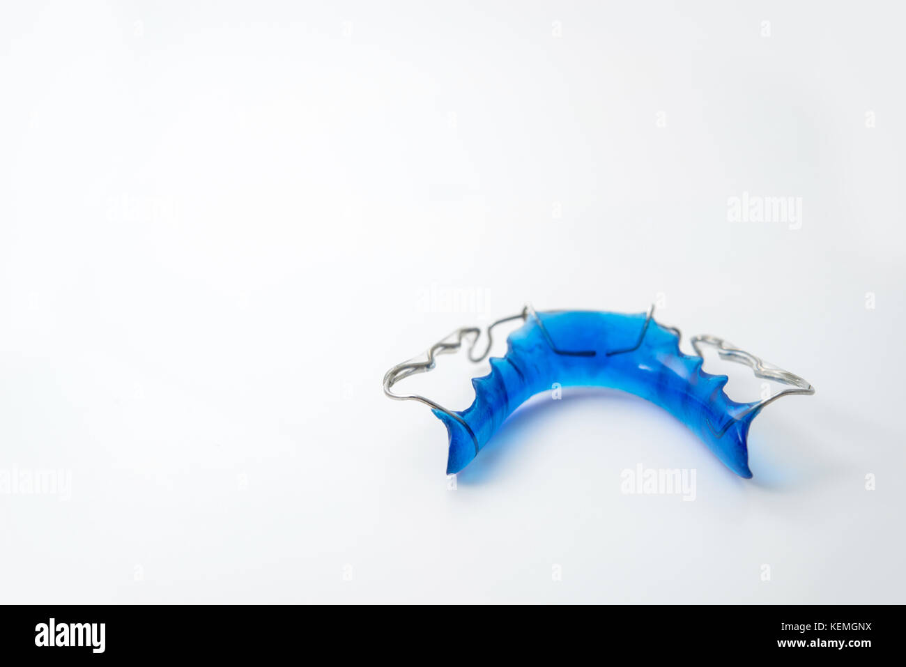 retainer orthodontic equipment on white background Stock Photo - Alamy