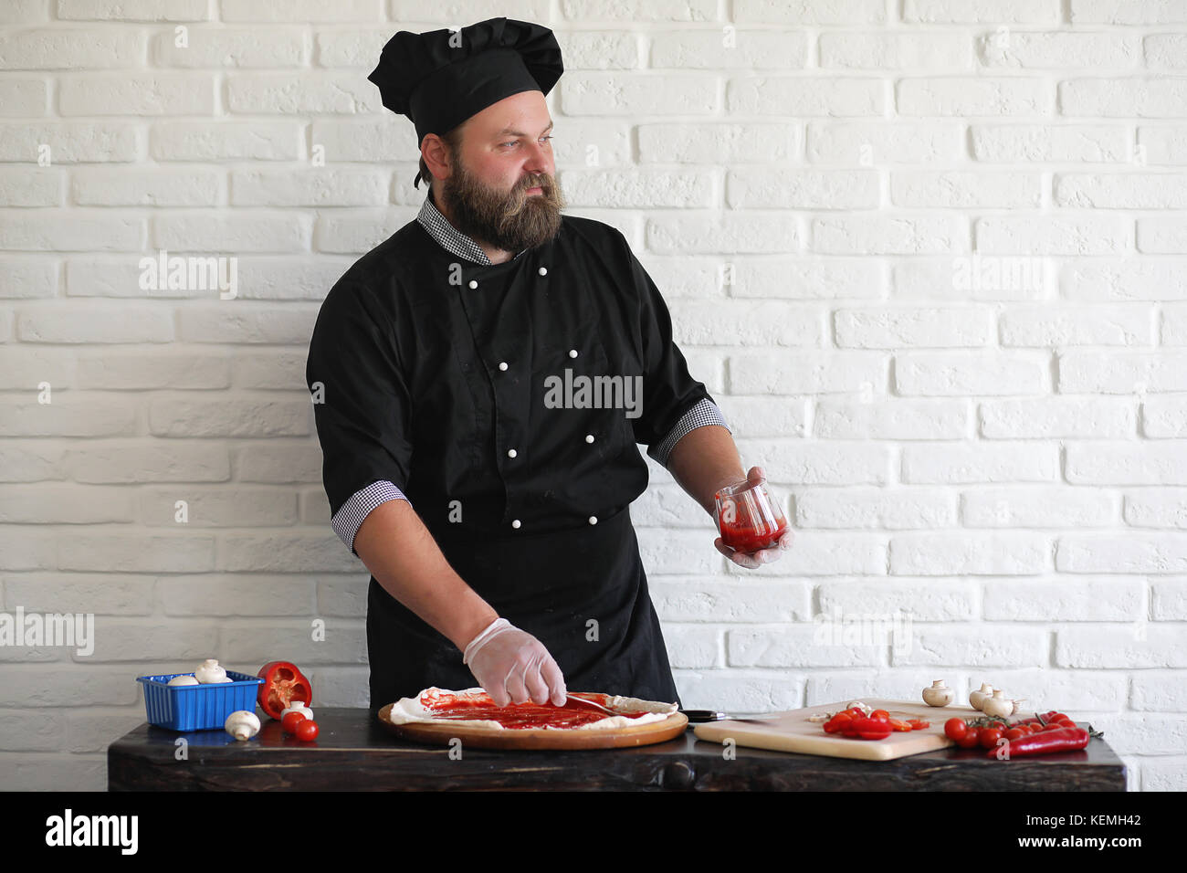 Bearded chef cooking meals hi-res stock photography and images - Alamy