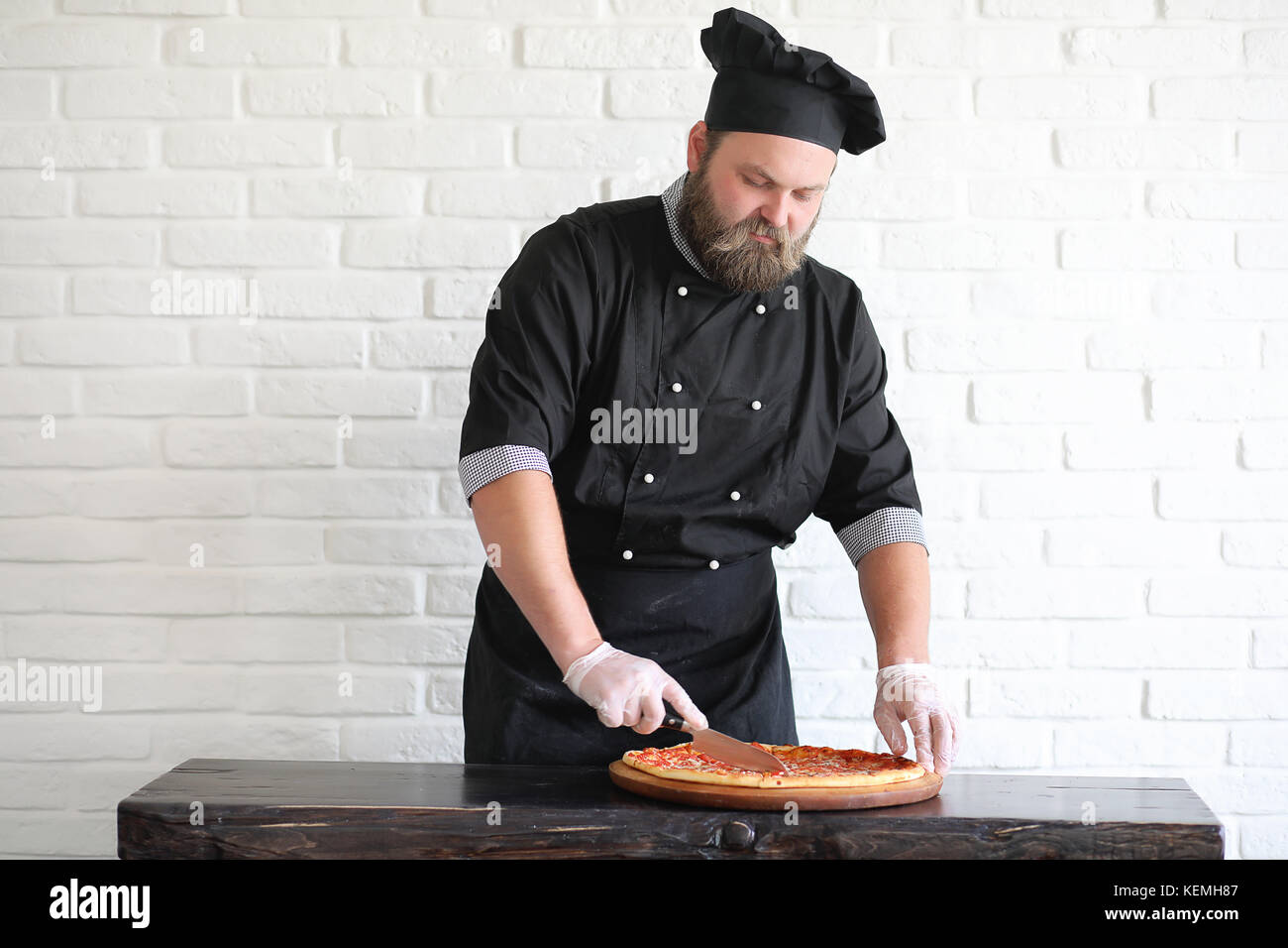 Bearded chef cooking meals hi-res stock photography and images - Alamy