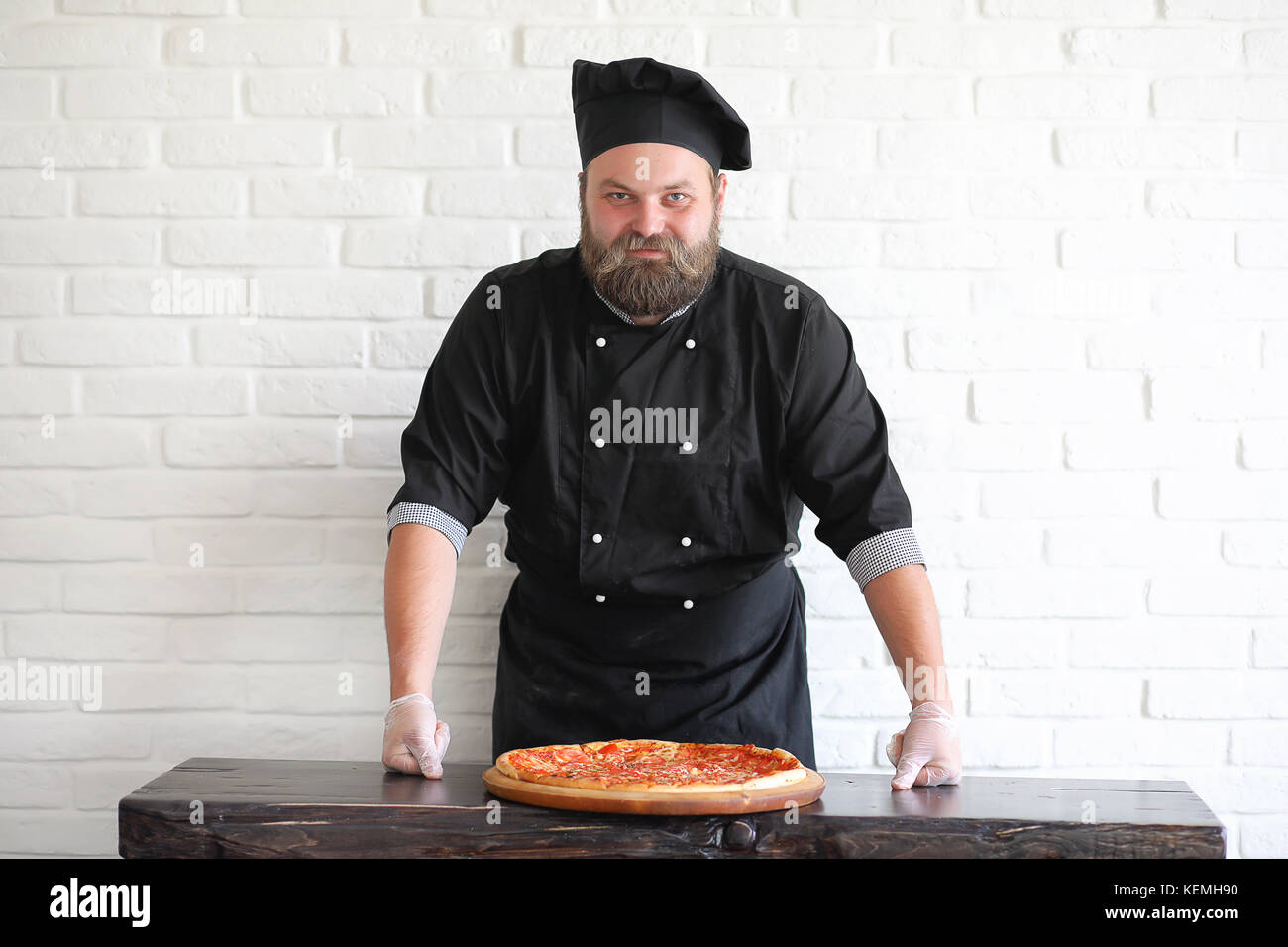 Bearded chef cooking meals hi-res stock photography and images - Alamy